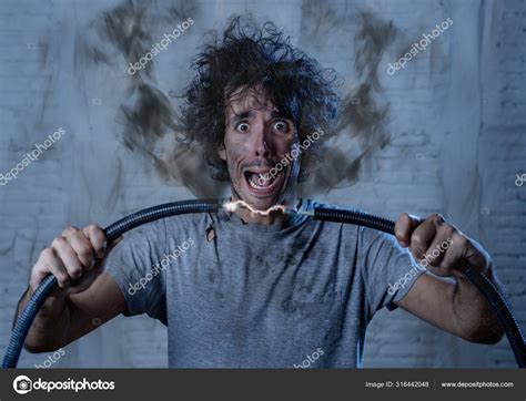 Electric Shocked Man Stressed Businessman With Broken Cable In Hands