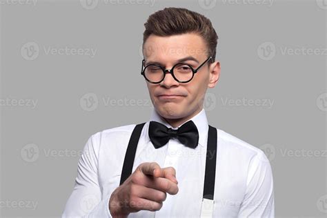 I Choose You Portrait Of Young Nerd Man In Bow Tie And Suspenders Pointing Camera While Standing