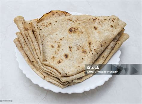 Tawa Chapati Roti Served In Plate Isolated On Table Top View Of Indian