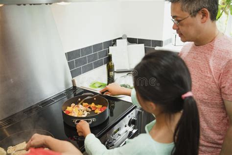 Learning How To Cook With Dad Stock Image Image Of Father Domestic