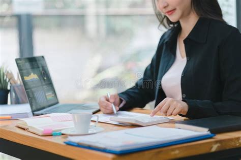 The Female Analyst Utilizes A Computer And A Dashboard For Business Data Analysis And A Data