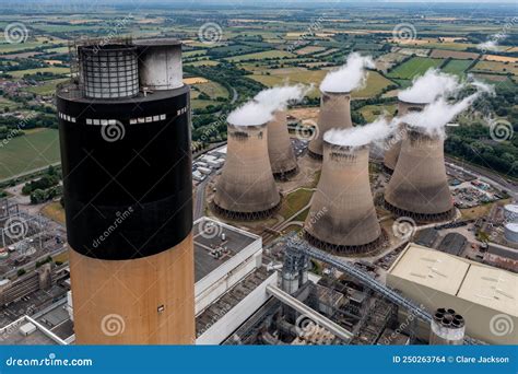 Aerial View Of A Coal Fired Power Station Chimney And Cooling Towers