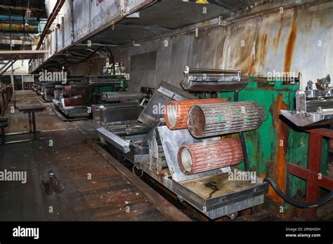 Large Metal Rollers Rolls With Teeth Of The Gears Of The Production