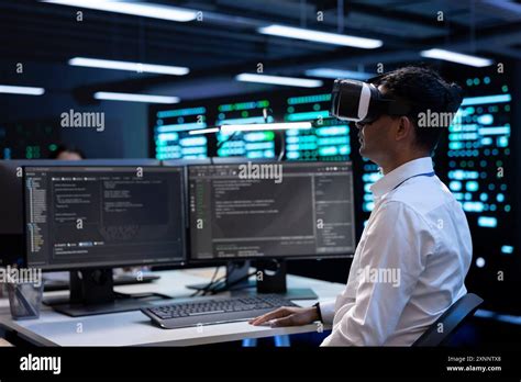 Developer Immersed In Virtual Reality In Server Hub Doing Units