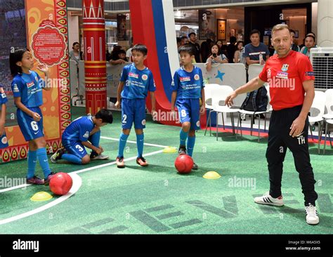 German Former Football Player Thomas Hassler In Red Attends A