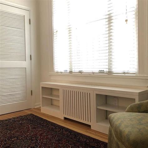 Stylish Built In Bookshelves With Radiator And Ac Access