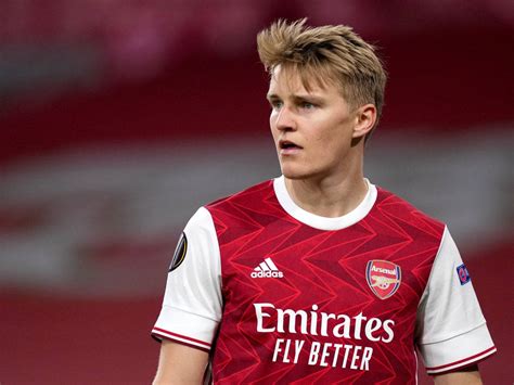 Download Midfield Maestro Martin Ødegaard In Action Wallpaper