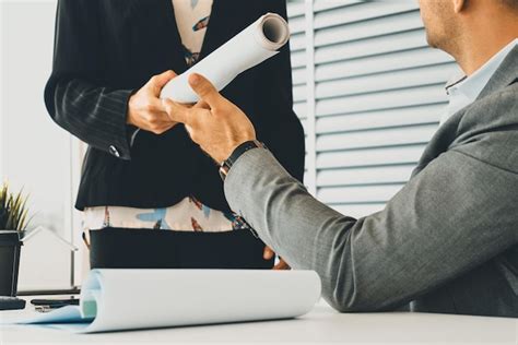 Premium Photo Businessman Get Finished Work From Businesswoman Uds