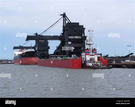 Bulk Carrier Rainkiss With Refuelling Barge And Tugboat At Lamberts Point Transloading Facility
