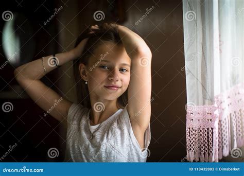 Funny Girl Posing For The Camera Sitting At The Table Stock Image Image Of Hair Girl 118432883