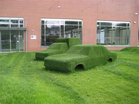 Grass Covered Cars In Berlin
