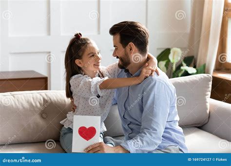 Girl Hugging Dad At Charles Zeigler Blog