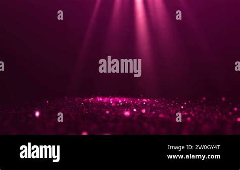 Glittering Particles Of Ruby Color With Spotlights And Dust On Blurred