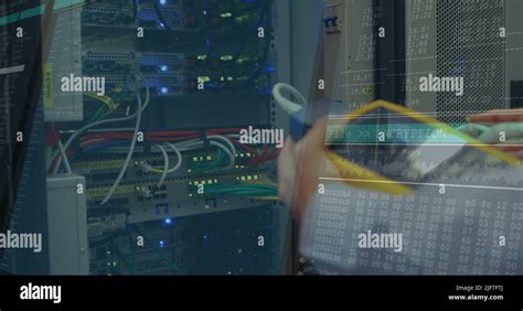 Image Of Data Processing On Computer Screens Over Man Checking Computer