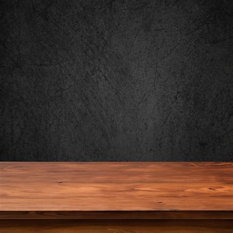 Premium Photo Brown Table With Black Background