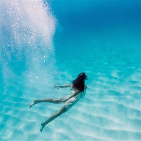 Ethereal Underwater Photos Capture Young Womans Deep Connection With