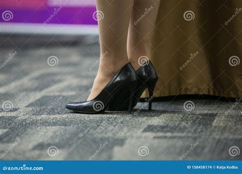 When The Lady Is Not Used To Wear High Heels Royalty Free Stock