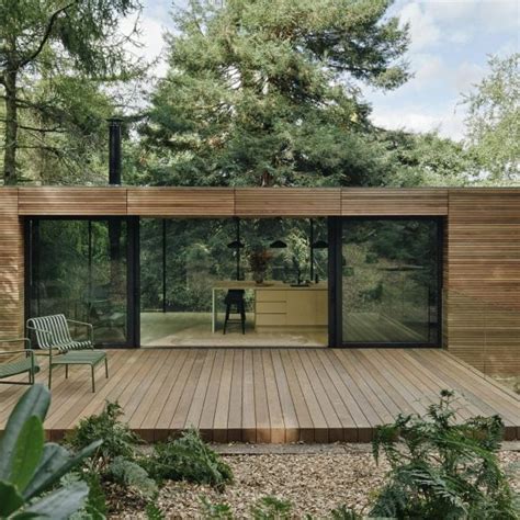 Looking Glass Lodges Glass Facades Reflect The Surrounding Woodland