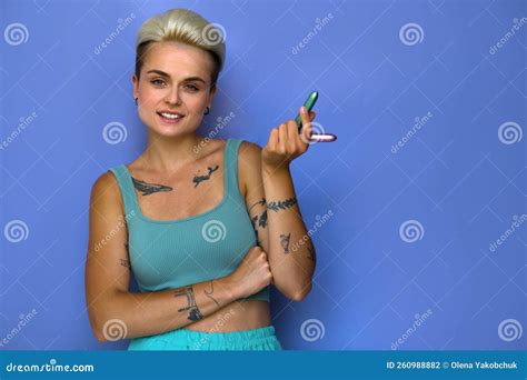 Short Haired Girl Standing With Two Vibrator For Clitoral Vaginal