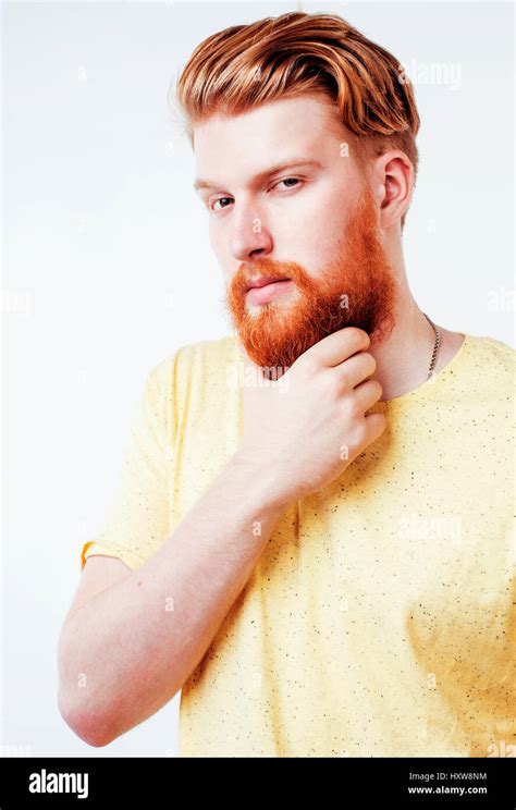 Young Handsome Hipster Ginger Bearded Guy Looking Brutal Isolated On