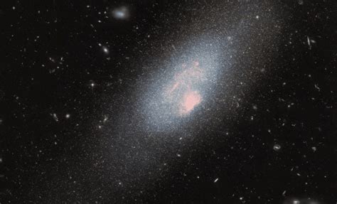 Hubble Telescope Captures Explosive Starbirth In Tiny Galaxy 13 Million Light Years Away