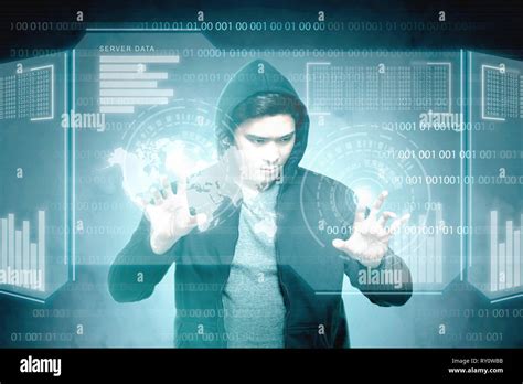 Young Asian Hacker In Black Hoodie Touching Virtual Screen With Server Data Binary Code Bar