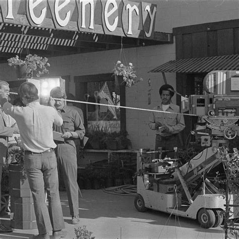 Crewman Measures Distance From Camera To Actor James Wainwright In Filming For The New Tv