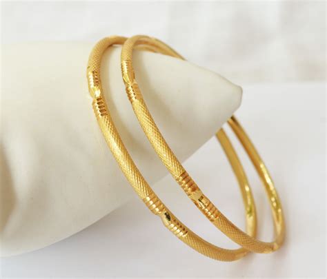 Fine Gold Plated Bangles Traditional Gold Churidar With Self Design