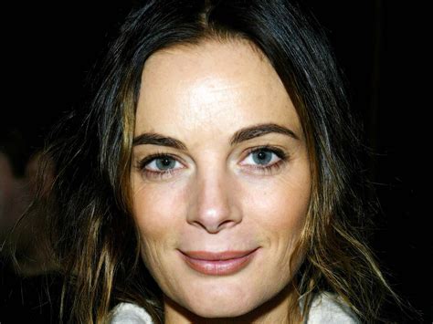 Download Stunning Gabrielle Anwar Posing In A Stylish Outfit Wallpaper