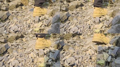 登山脚步特写走过碎石路攀登山顶跋山涉水视频素材下载