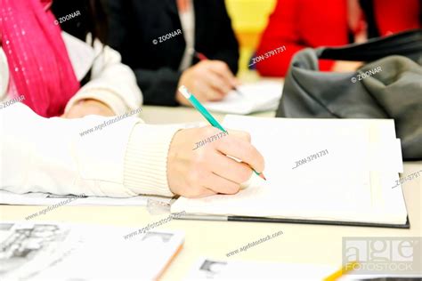 Education Concept With Students Who Taking Notes And Learning Lessons Stock Photo Picture And