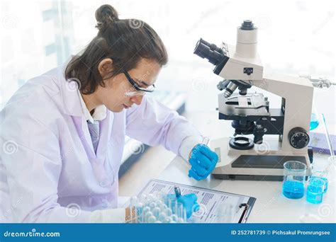 Laboratory Research Concept Scientist Analyzing Sample In Test Tube