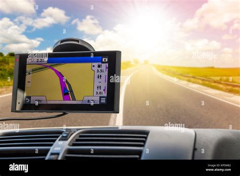 Close Up Of Gps Navigation System Device In Travelling Car Stock Photo Alamy
