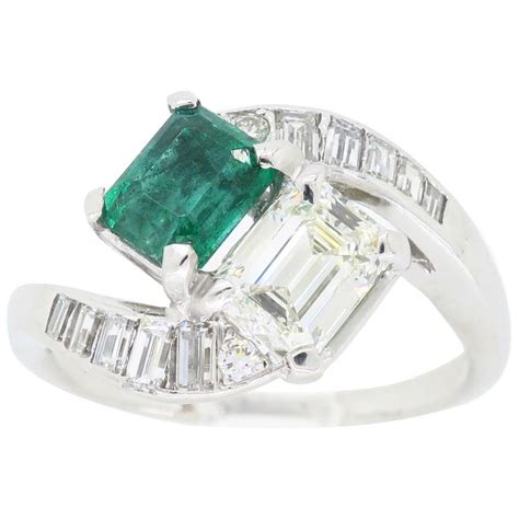 Estate Diamond And Emerald Bypass Ring In Platinum At 1stdibs