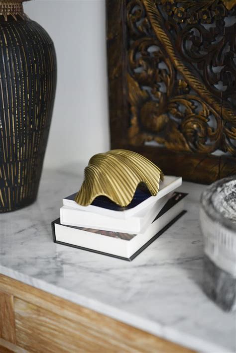 Sea Shell Brass Teak Talk