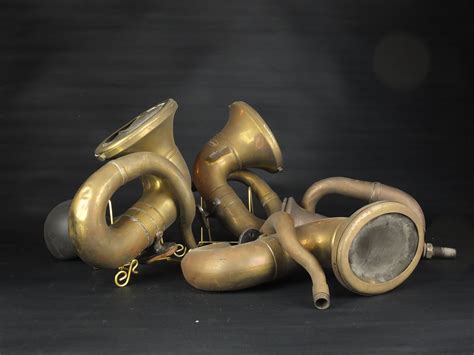 Bonhams Cars A Group Of Four Small Brass Horns