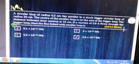 a circular loop of radius 0 3 cm lies parallel to a much bigger circular