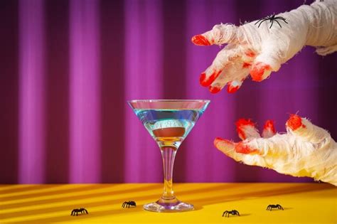 Premium Photo Hands Wrapped In A Bandage With A Cocktail