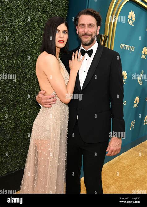 Alexandra Daddario Left And Andrew Form Arrive At The 74th Emmy