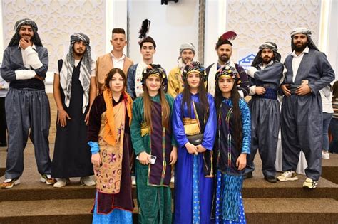 Assyrians Wearing Traditional Clothes And Representing Various Regions