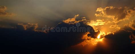 Sunlight Sun Rays Shining Through Clouds In Sky Symbolizing Hope Stock