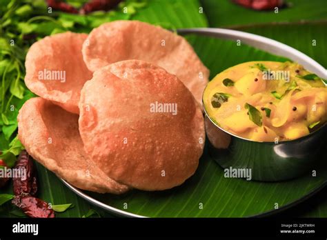 South Indian Famous Breakfast Poori Or Puri With Potato Curry Served In