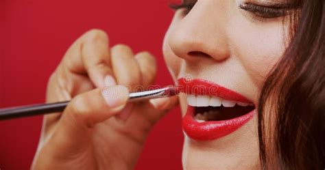 Woman Brush And Lipstick For Beauty In Studio With Makeup Facial