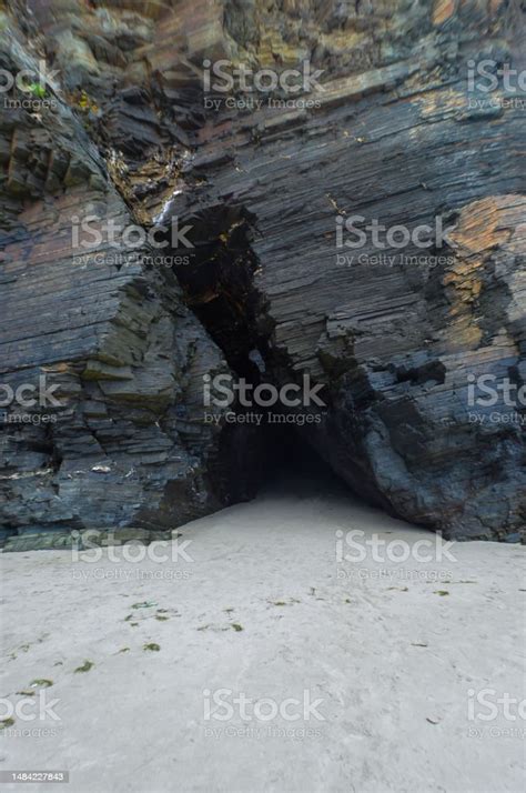 The Cliffs Form Capriciously Shaped Caves On Playa De Las Catedrales