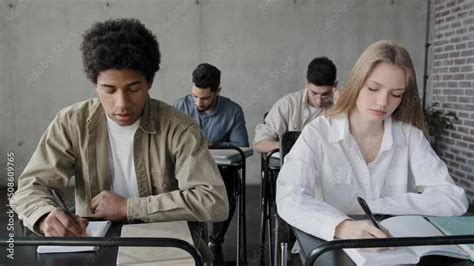 Diverse Young Group People Classmates Sitting In Classroom At Lecture