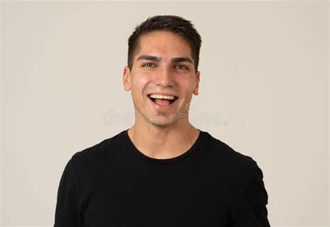 Portrait Of Attractive Cheerful Young Man With Smiling Happy Face