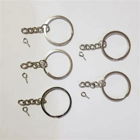 خرید و قیمت جا سوییچی ساده نقره ای بسته 30 عددی به همراه پیچ اتصال ترب