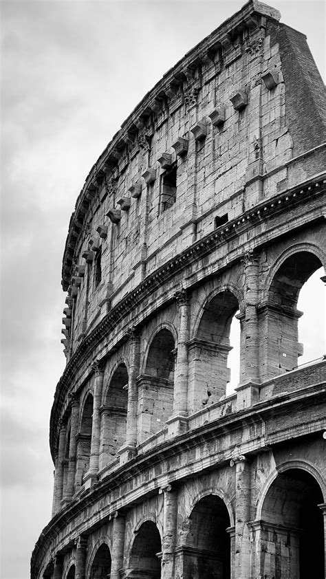 Coliseu Em Roma ícone Arquitetônico Atemporal · Foto Profissional Gratuita