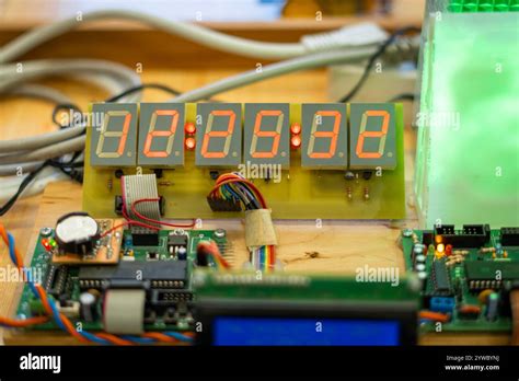 Close Up Of The Inside Of A Digital Clock Circuit With A Dial Stock Close Up Of The Inside Of A Digital Clock Circuit With A Dial Stock