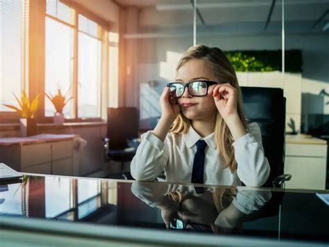 Thoughtful Businesswoman Biting Glasses At Desk Ai Image Generator